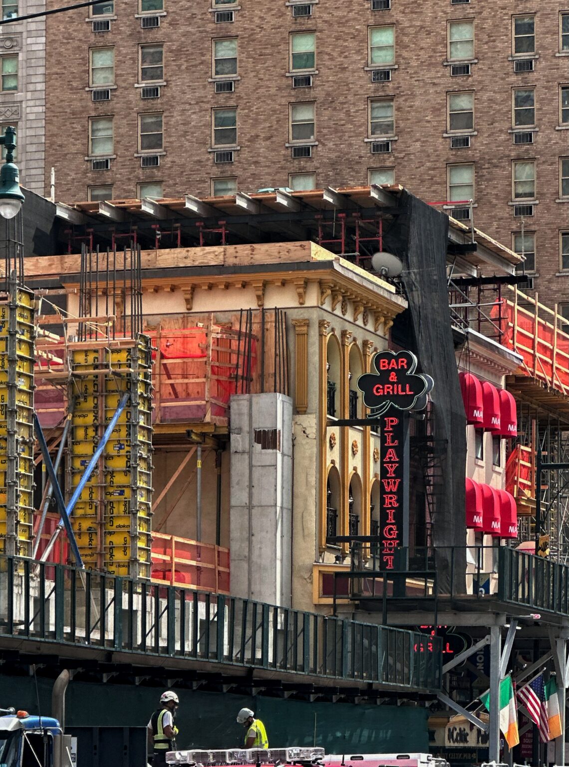 The Torch Begins Its Ascent at 740 Eighth Avenue in Times Square, Manhattan - New York YIMBY
