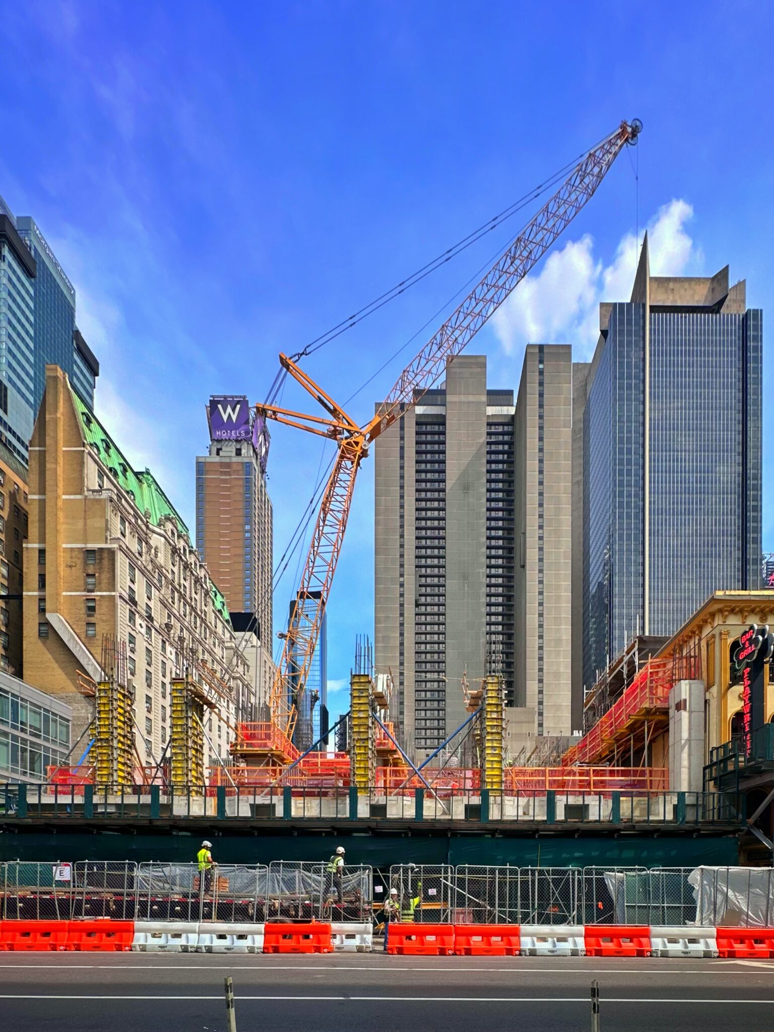 The Torch Begins Its Ascent at 740 Eighth Avenue in Times Square, Manhattan - New York YIMBY