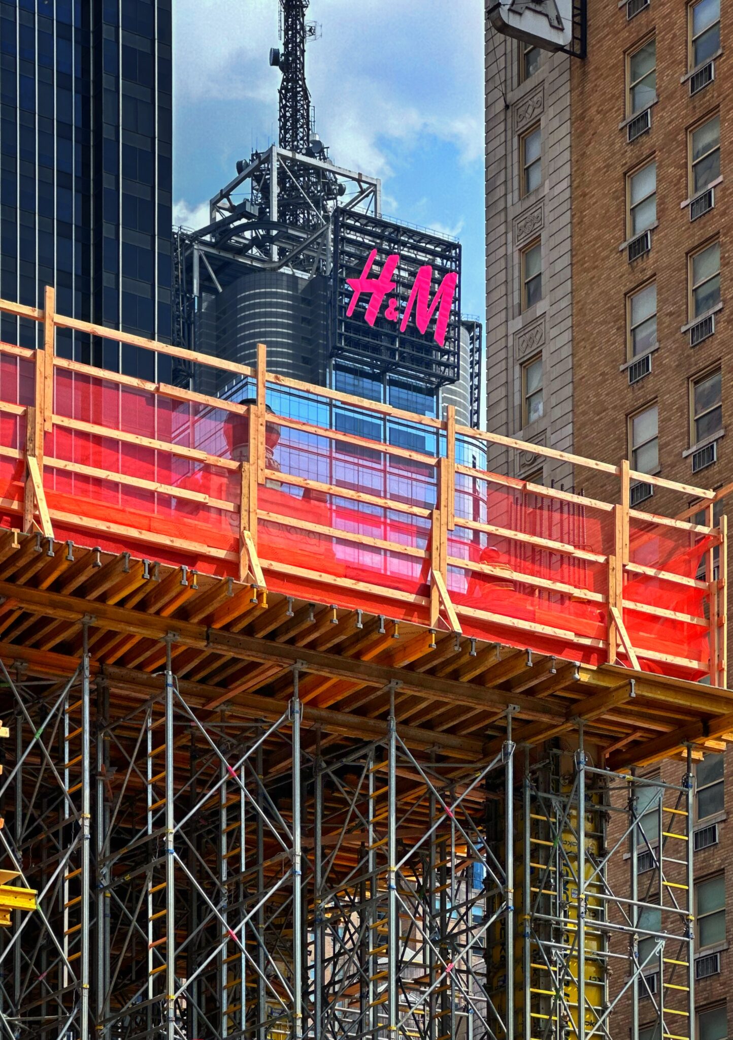 The Torch Begins Its Ascent at 740 Eighth Avenue in Times Square, Manhattan - New York YIMBY
