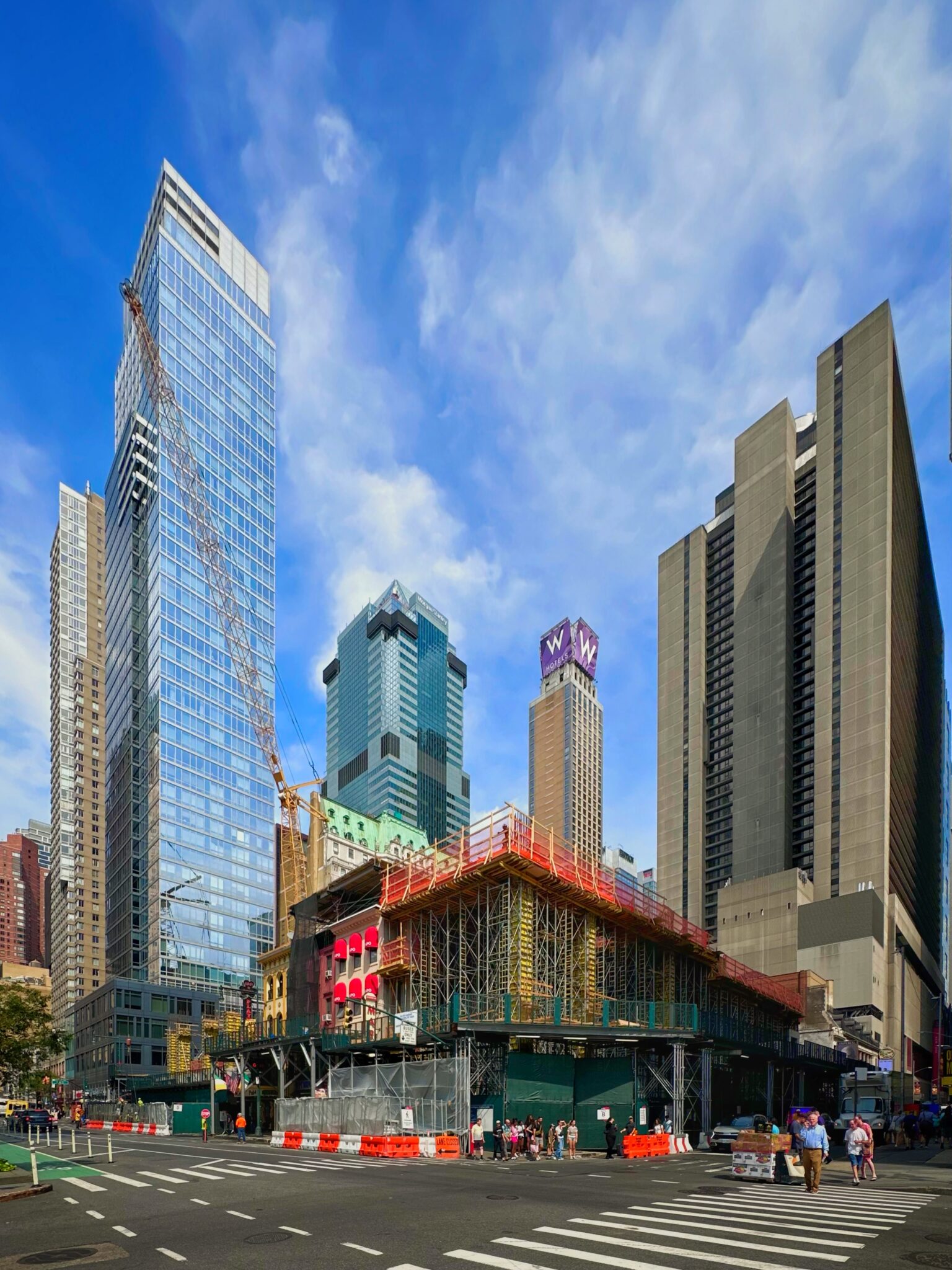 The Torch Begins Its Ascent at 740 Eighth Avenue in Times Square, Manhattan - New York YIMBY