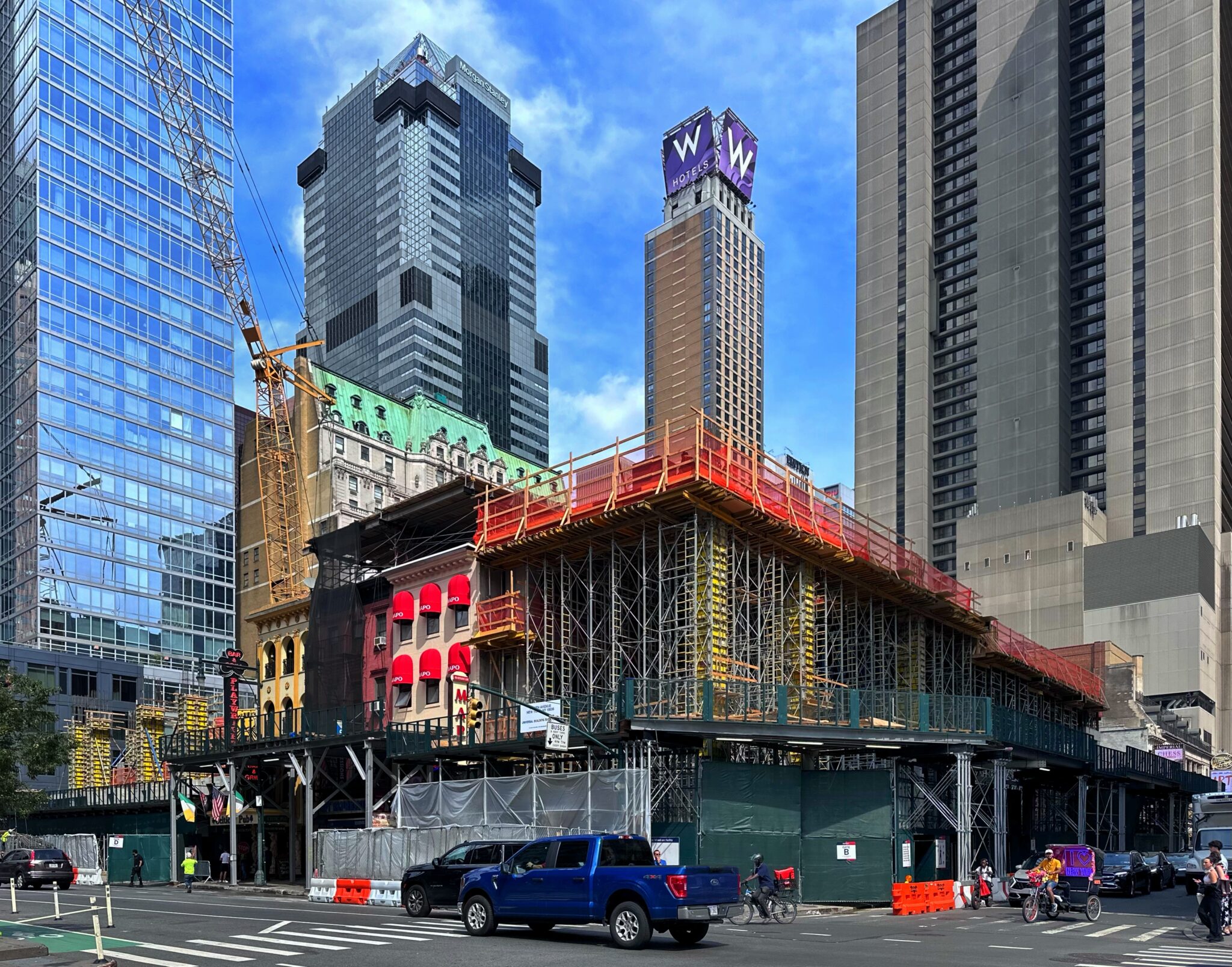 The Torch Begins Its Ascent at 740 Eighth Avenue in Times Square, Manhattan - New York YIMBY
