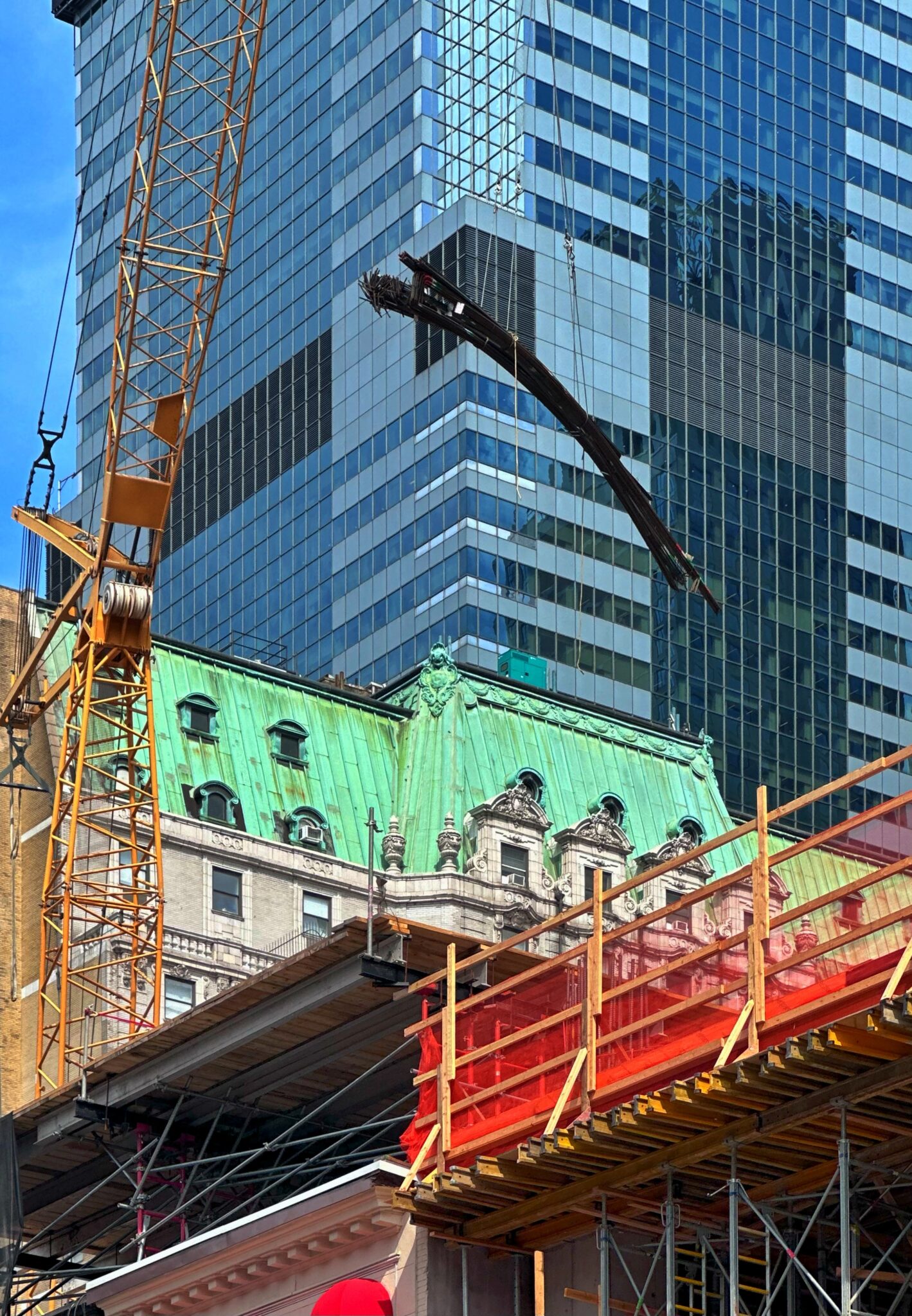 The Torch Begins Its Ascent at 740 Eighth Avenue in Times Square, Manhattan - New York YIMBY